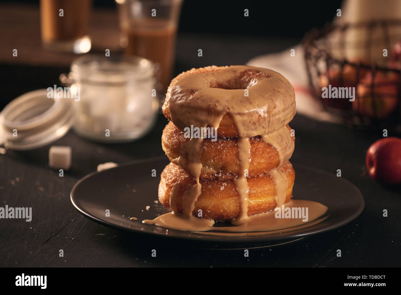 Close-up of donuts in stack with milk bottle and glass Stock Photo - Alamy