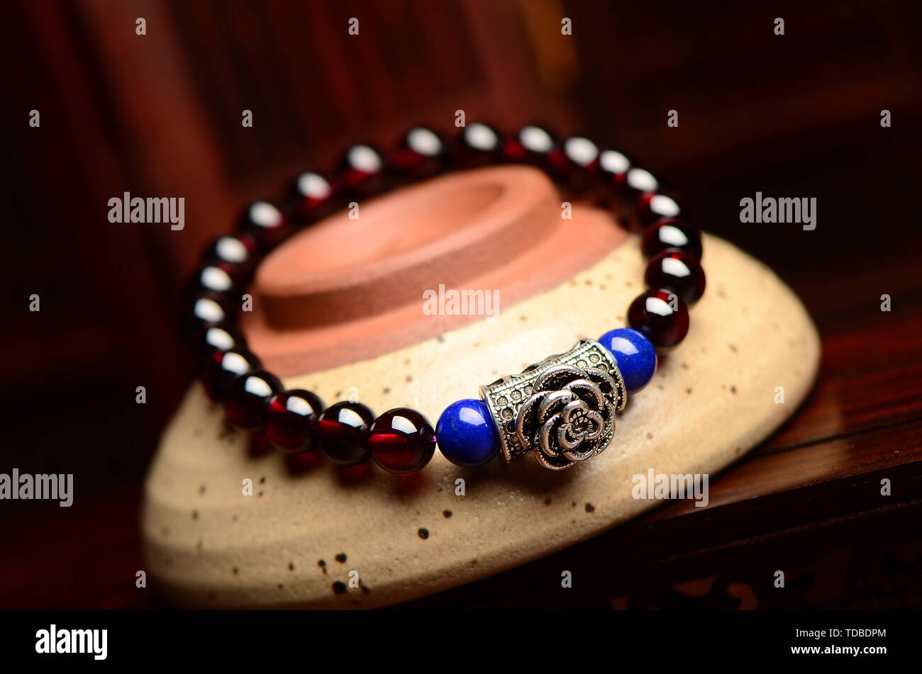 Garnet hand bracelet Stock Photo - Alamy
