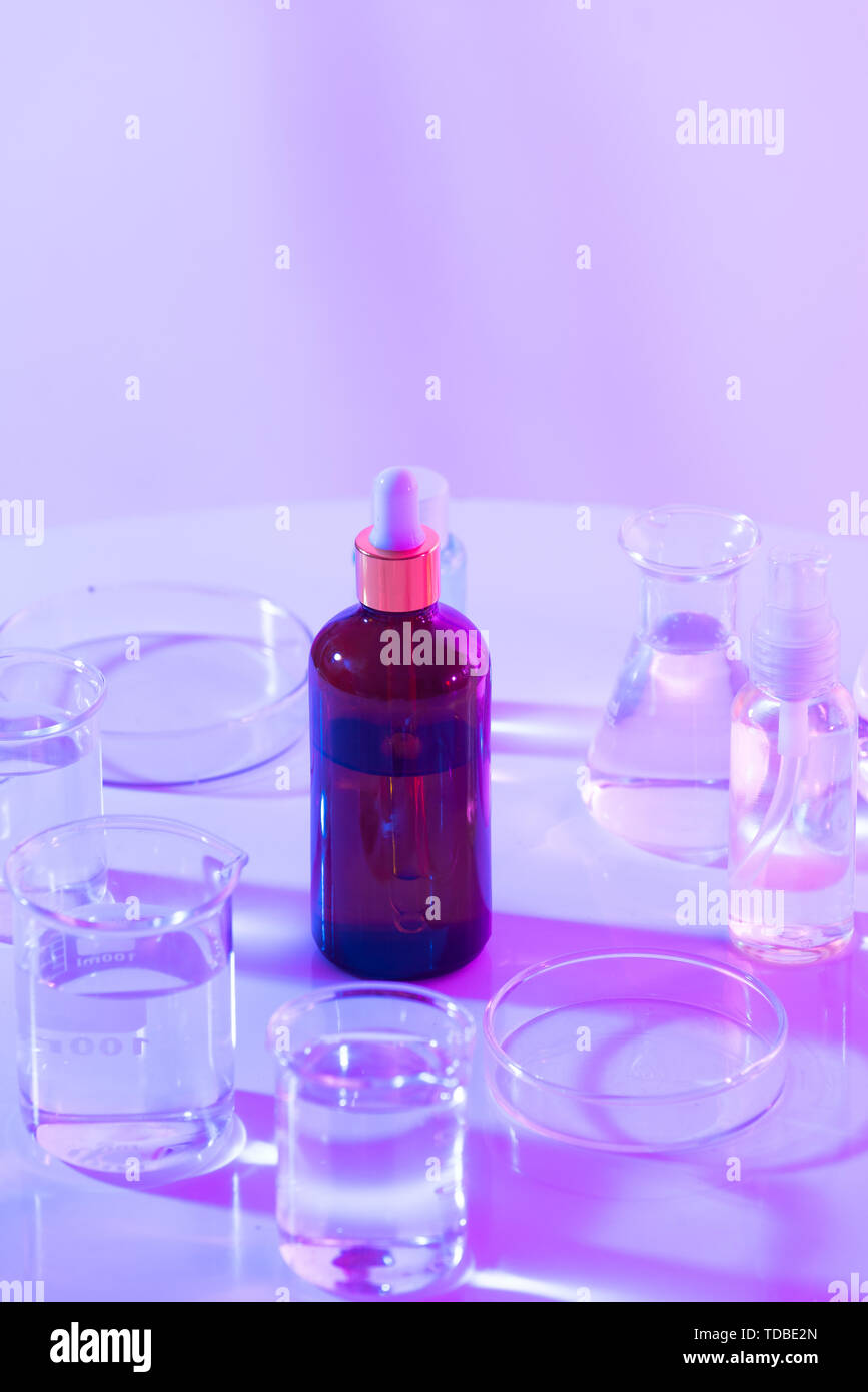 flask of water olution in science laboratory background Stock Photo - Alamy