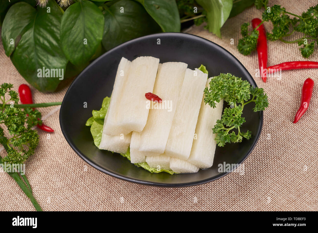 Hot pot side dish raw yam strips Stock Photo - Alamy