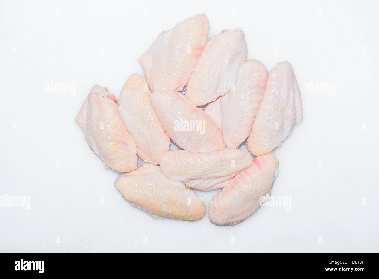Chicken wings on a white background Stock Photo - Alamy