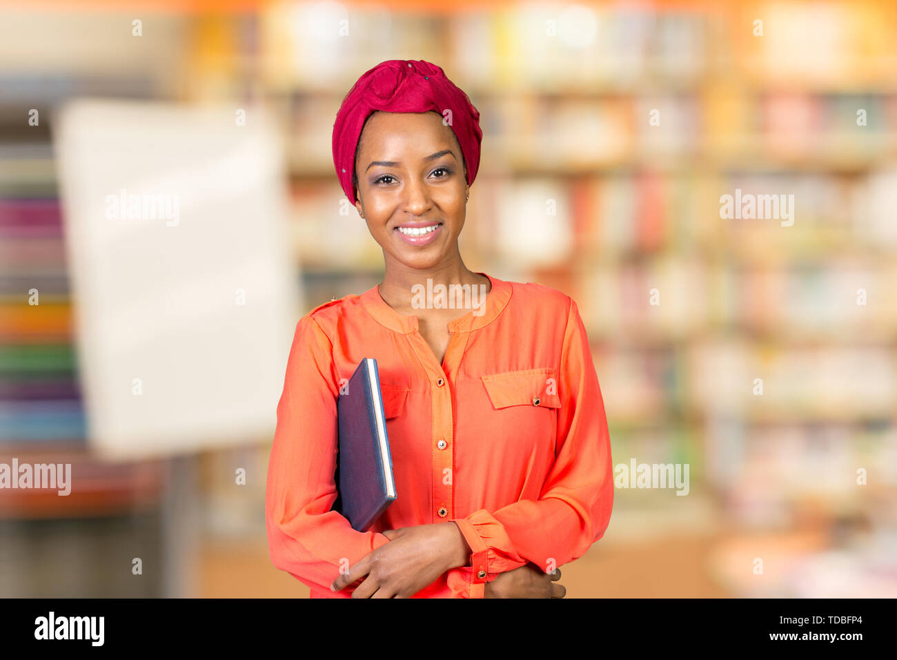 African american student with books Stock Photo - Alamy