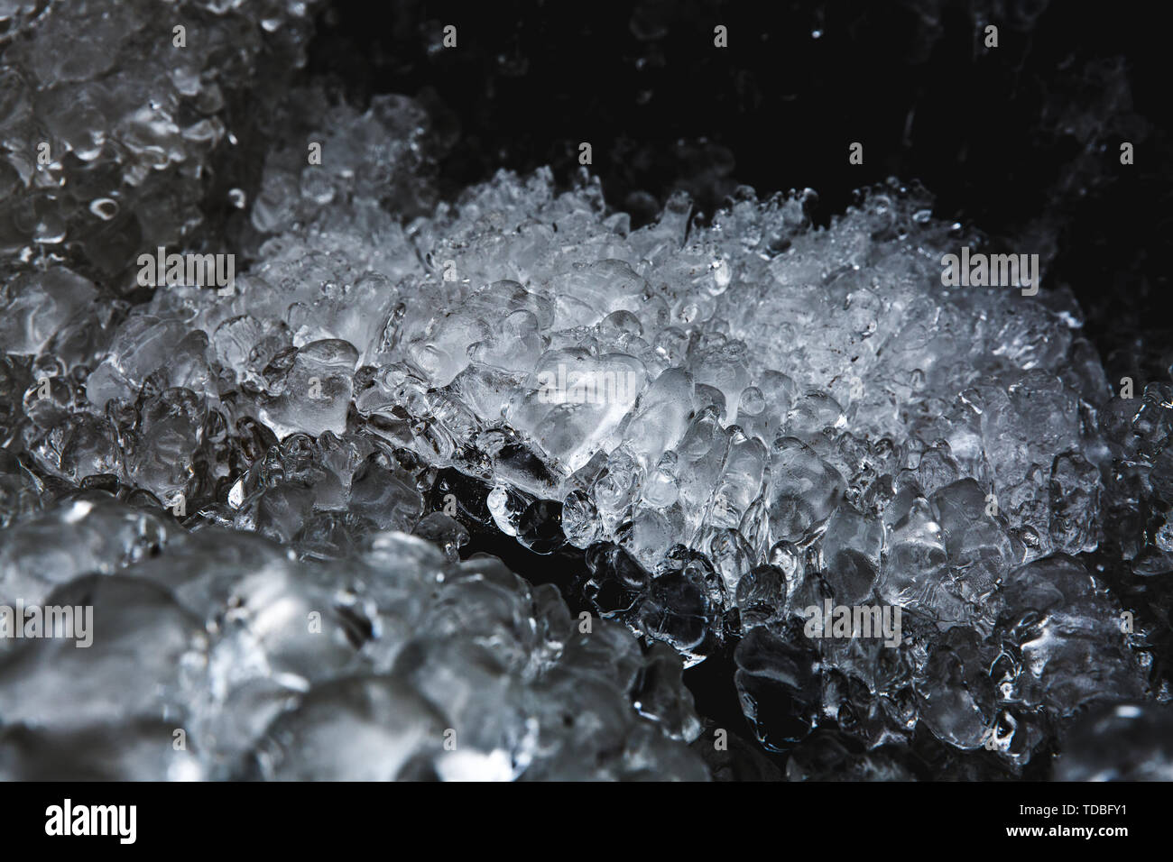 Ice dropping into water hi-res stock photography and images - Alamy