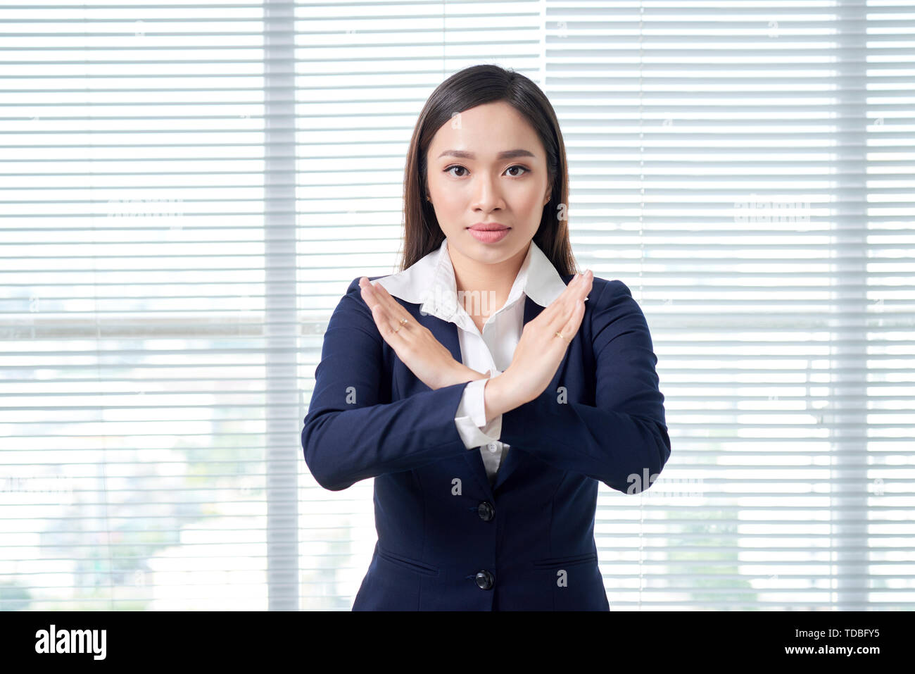 girl showing stop. woman showing stop hand Stock Photo - Alamy