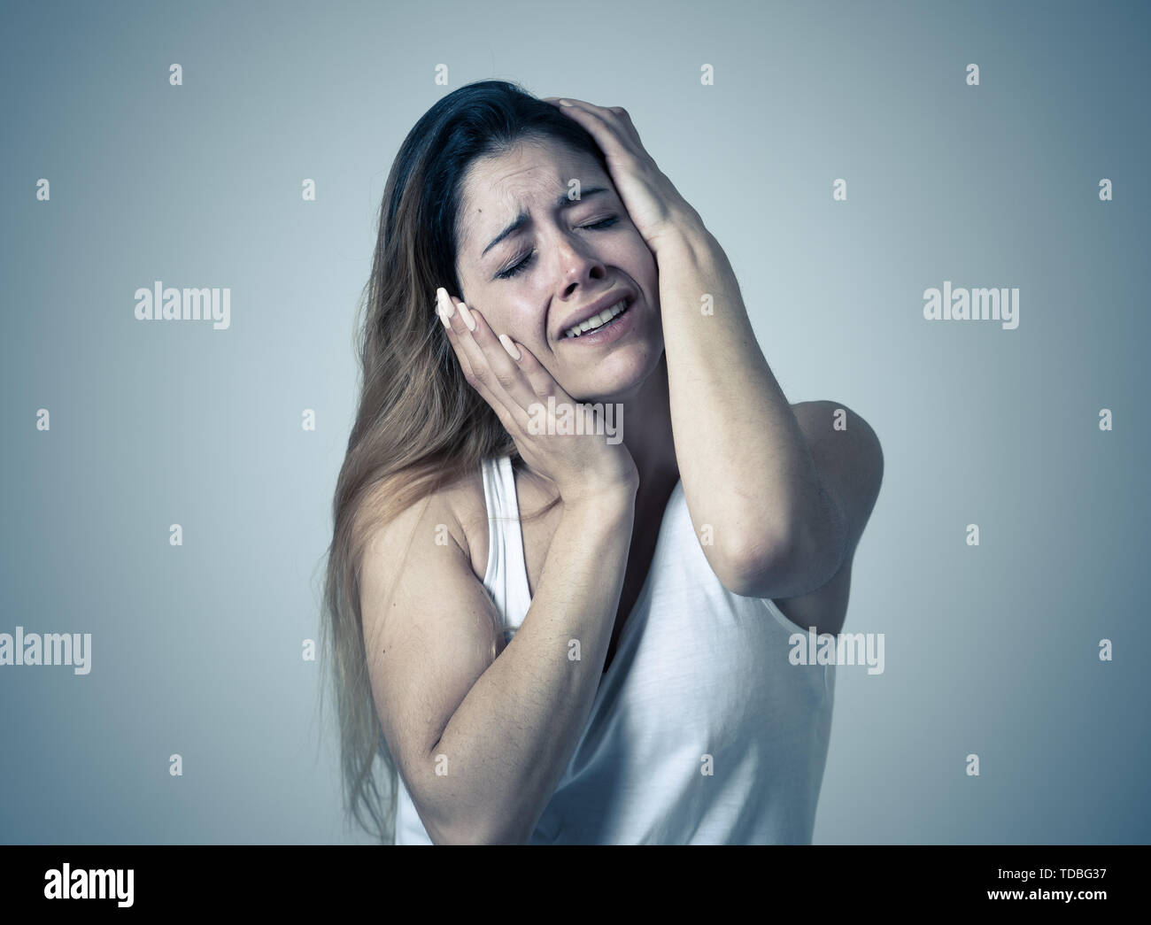 Young woman suffering from depression feeling miserable hopeless and ...