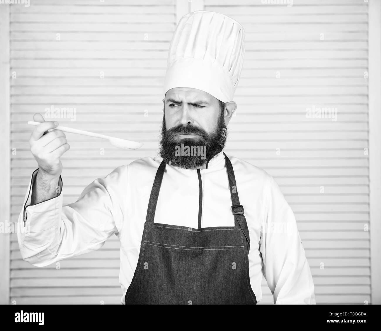 Preparation of food. Healthy food cooking. Bearded man cook in kitchen ...