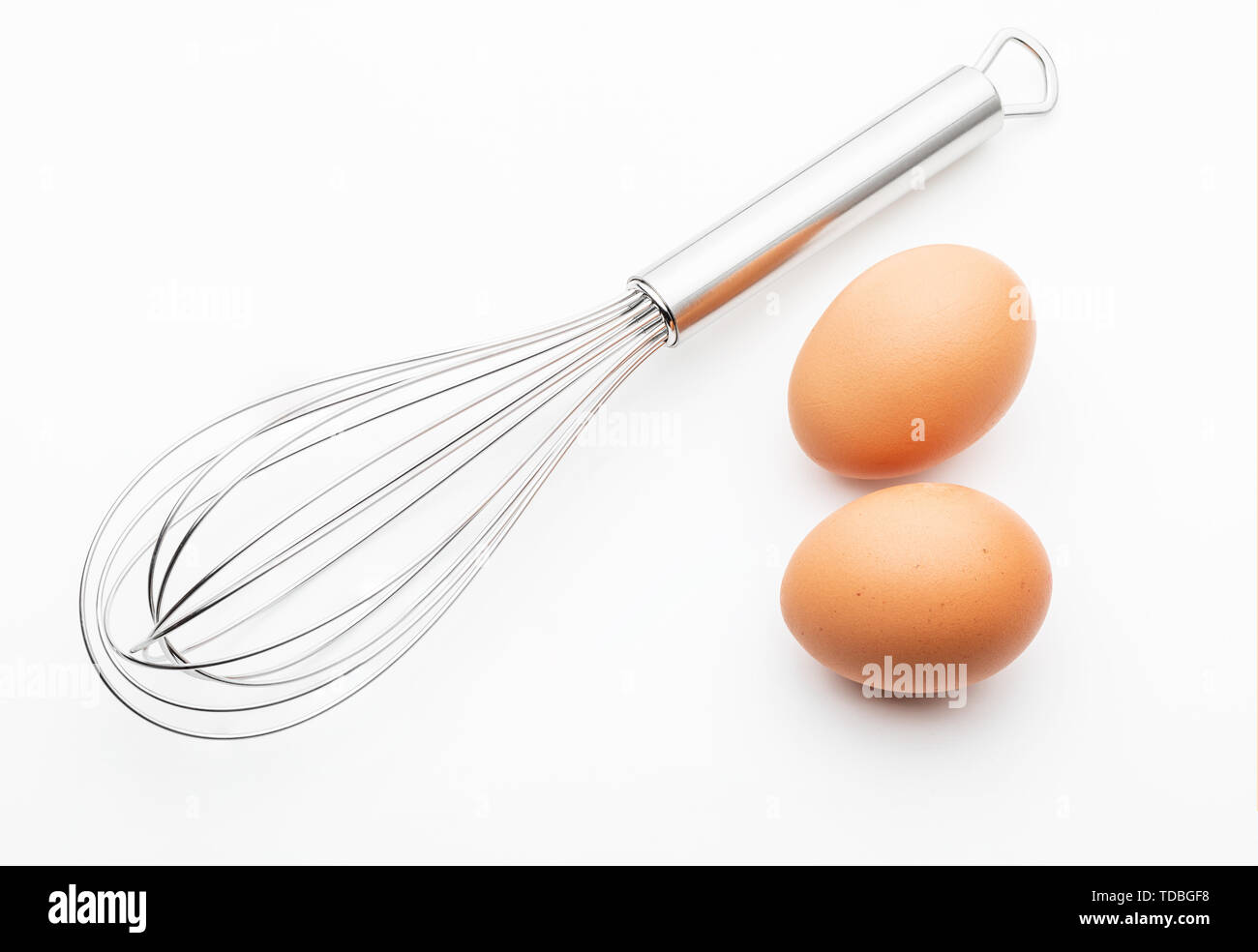 Metallic kitchen rods for manually mixing food with 2 fresh eggs ...