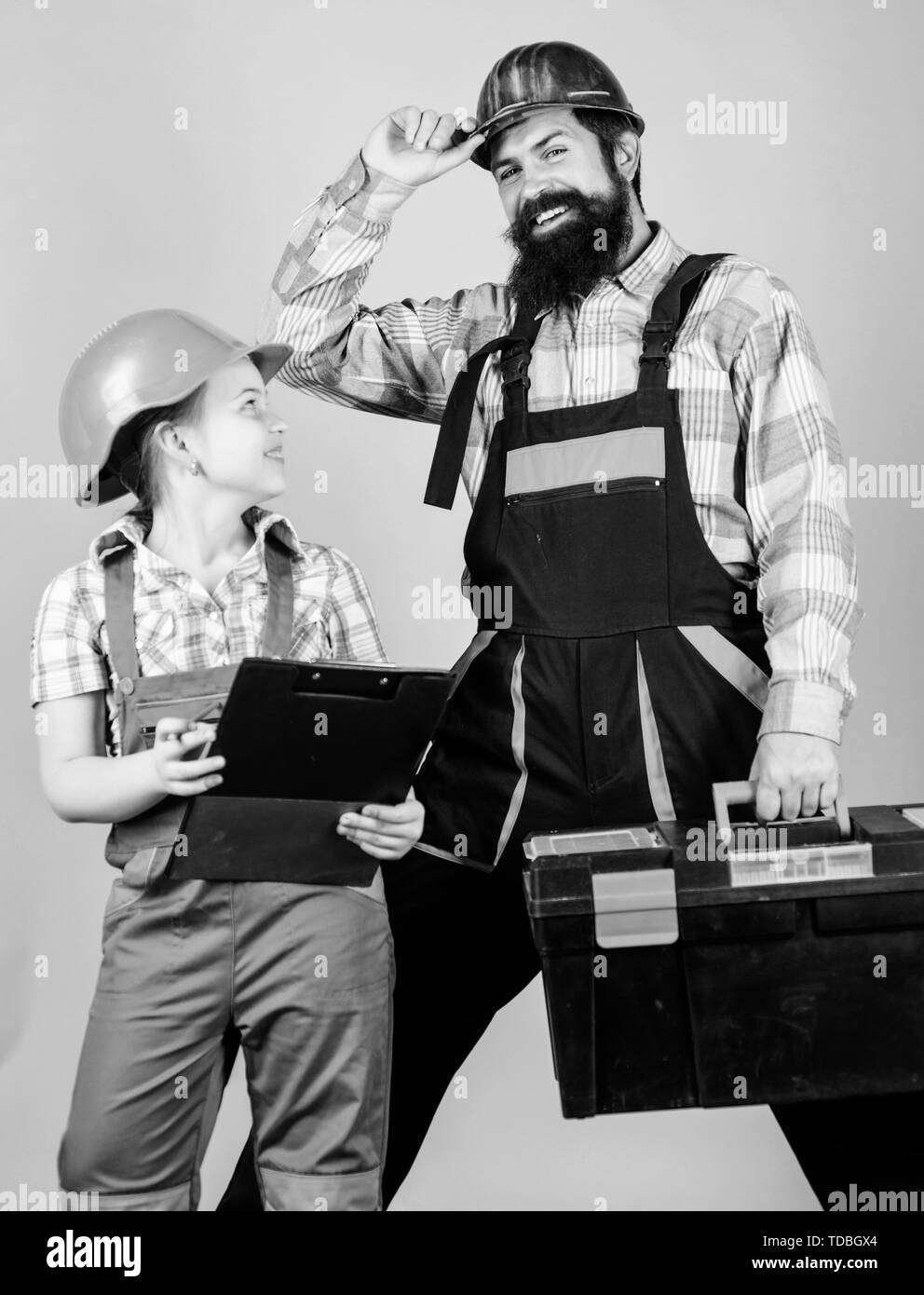 Repair. Children creativity. Bearded man with little girl. construction ...