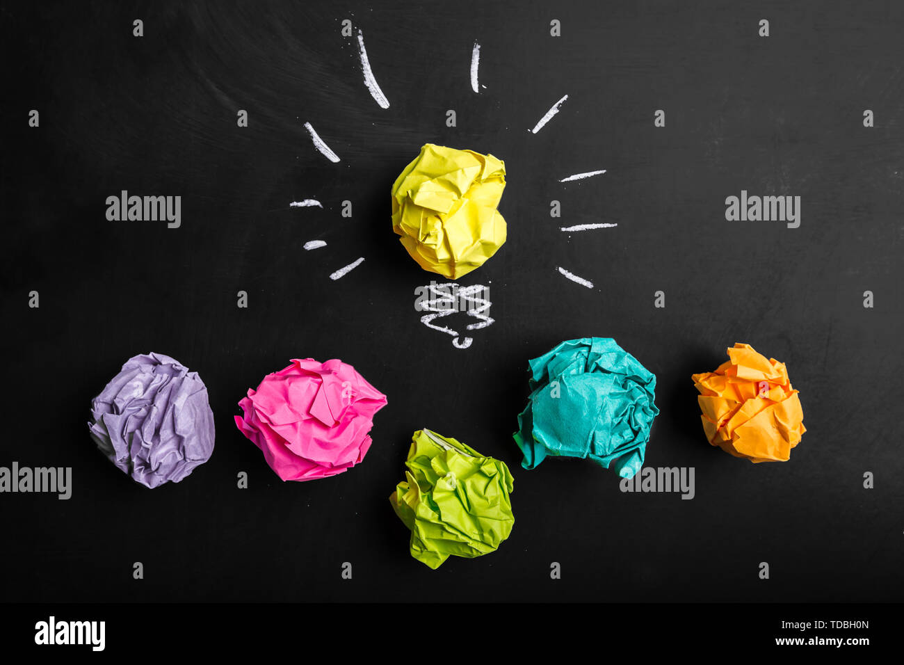 Great idea concept, crumpled paper on the chalkboard Stock Photo - Alamy