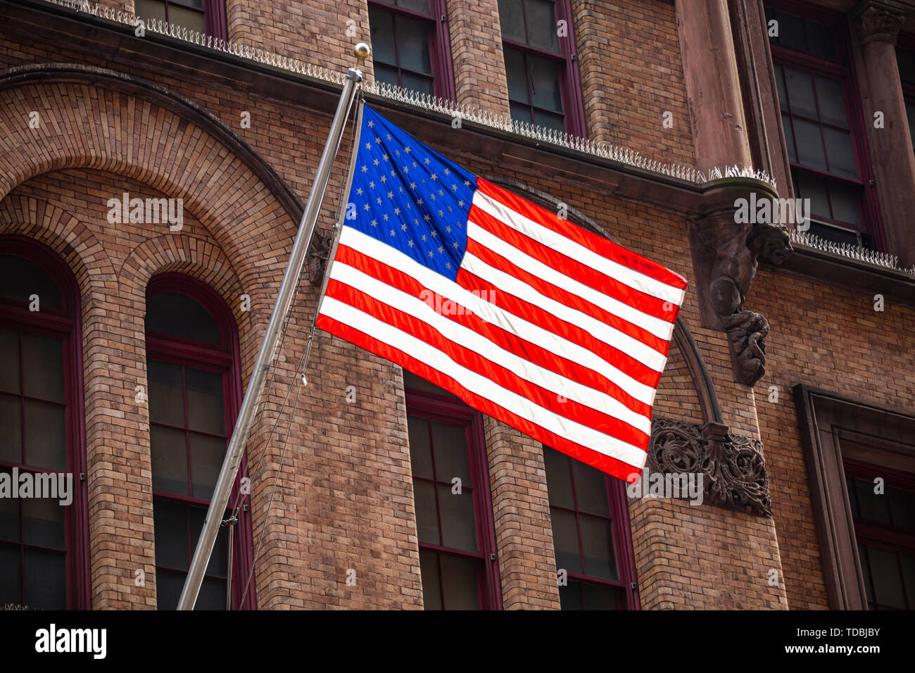 USA symbol in New York streets. American flag in Manhattan downtown ...
