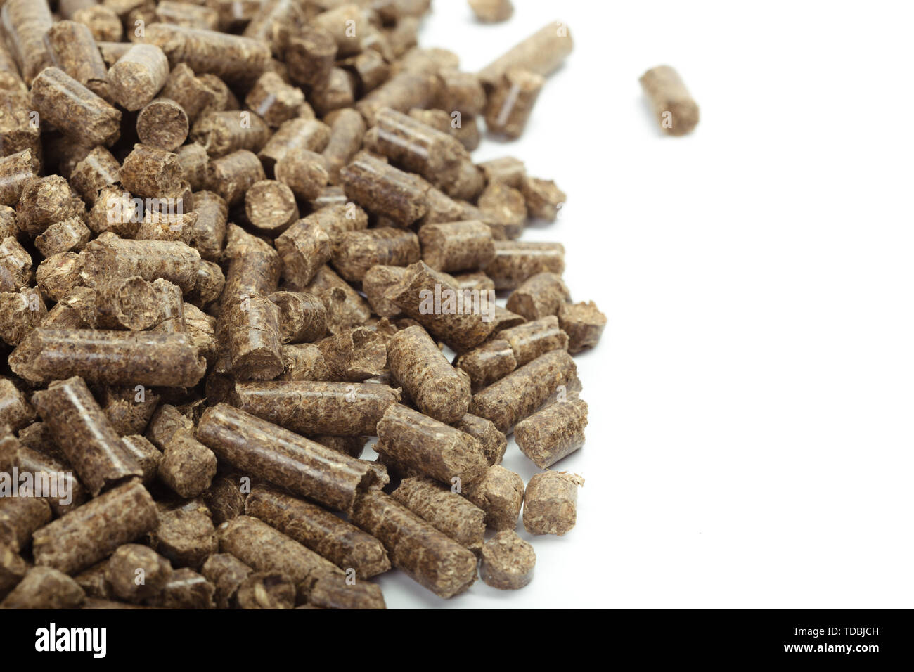 stack of wooden pellets for bio energy, white background, isolated ...