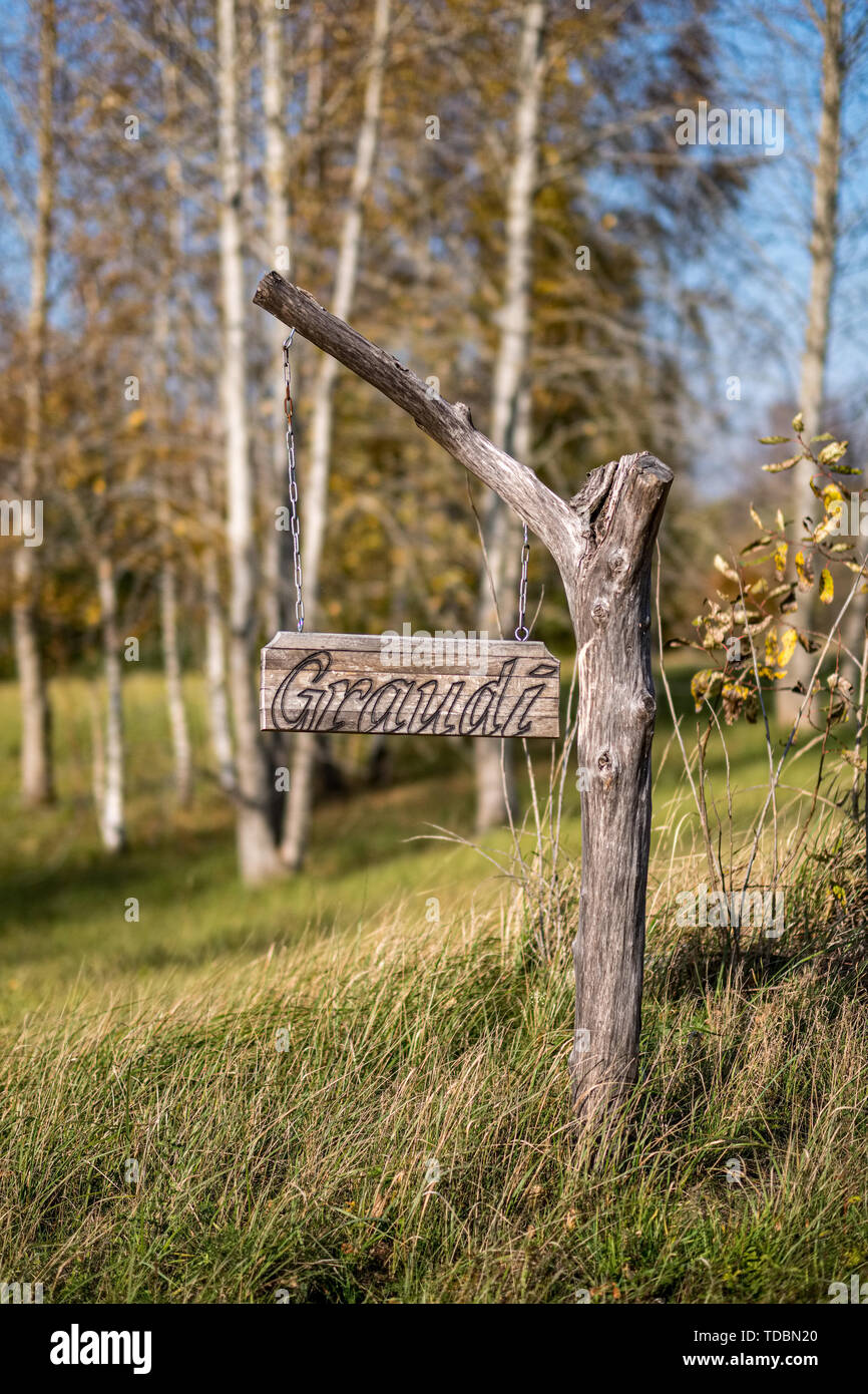 tourist direction signs in forest made of wood planks Stock Photo - Alamy
