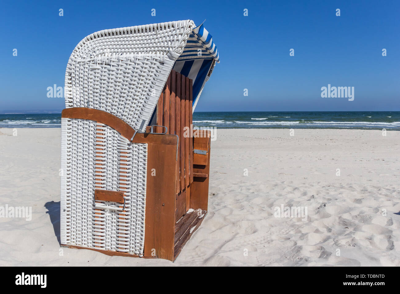 Traditional Strandkorb beach chair on Rugen island, Germany Stock Photo ...