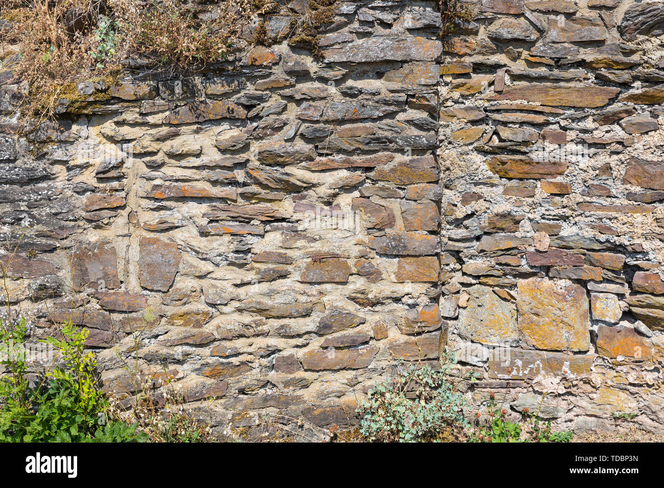 Stones background and texture of medieval castle wall Stock Photo - Alamy