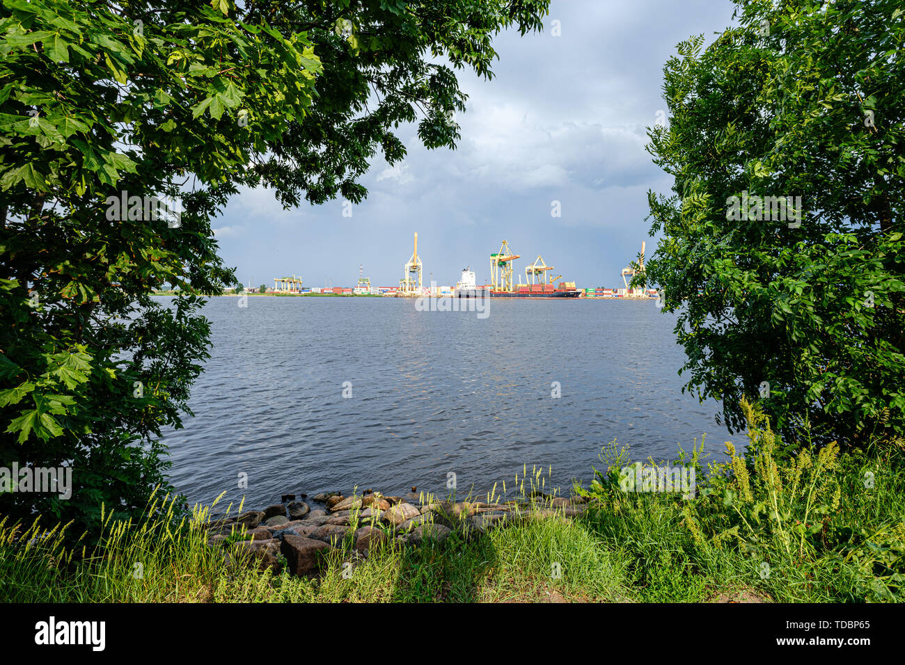 cargo shipping terminals in Riga, Latvia with high wind and dust flying ...