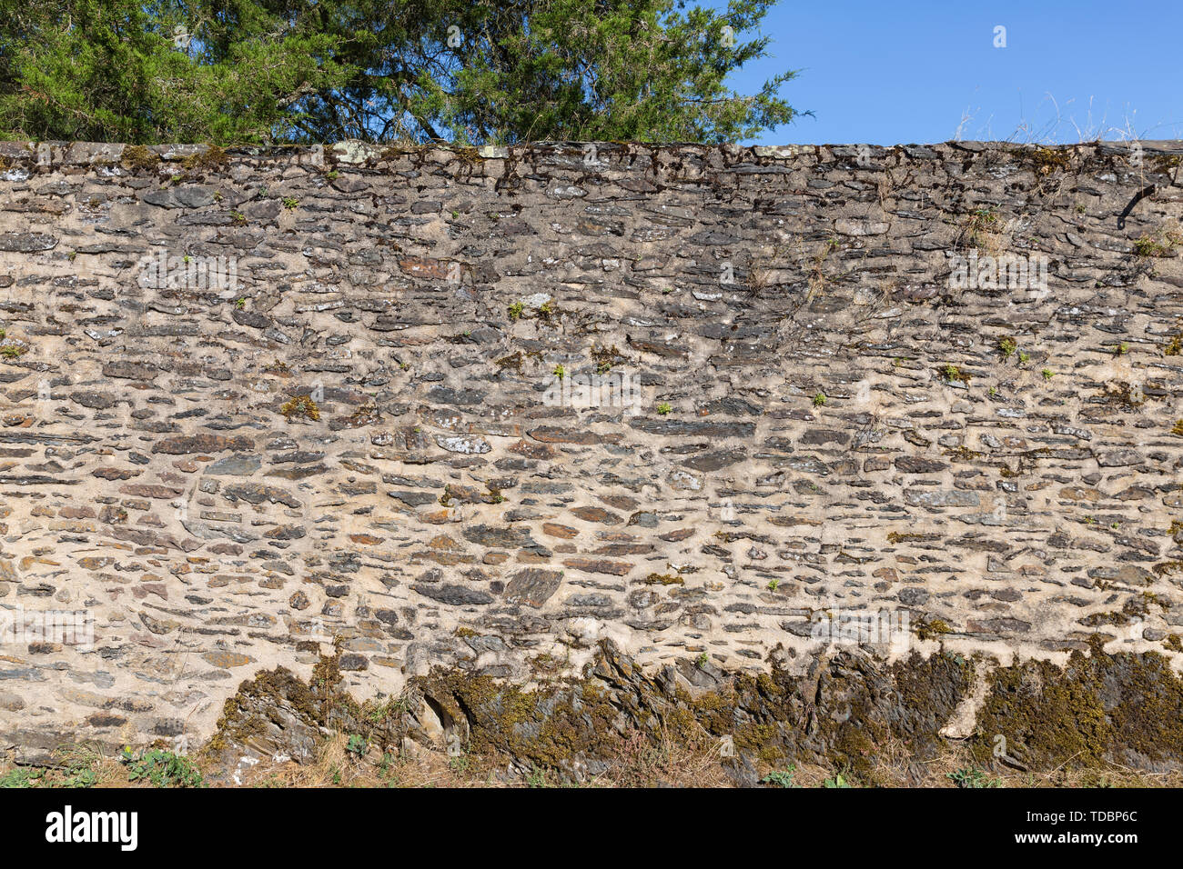 Stones background and texture of medieval castle wall Stock Photo - Alamy