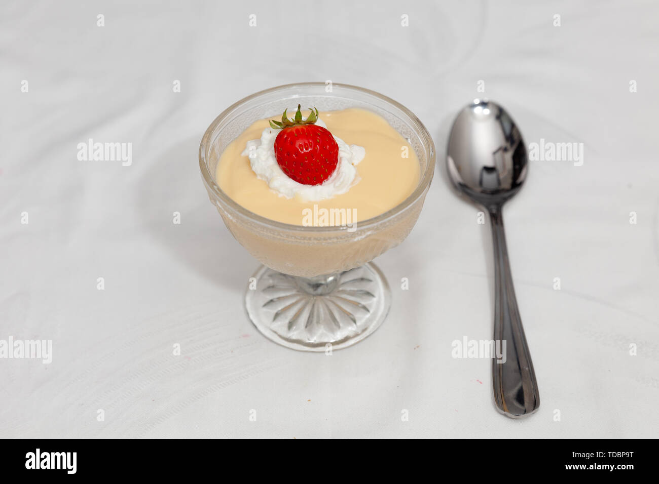 A Strawberry in Fresh cream Stock Photo - Alamy