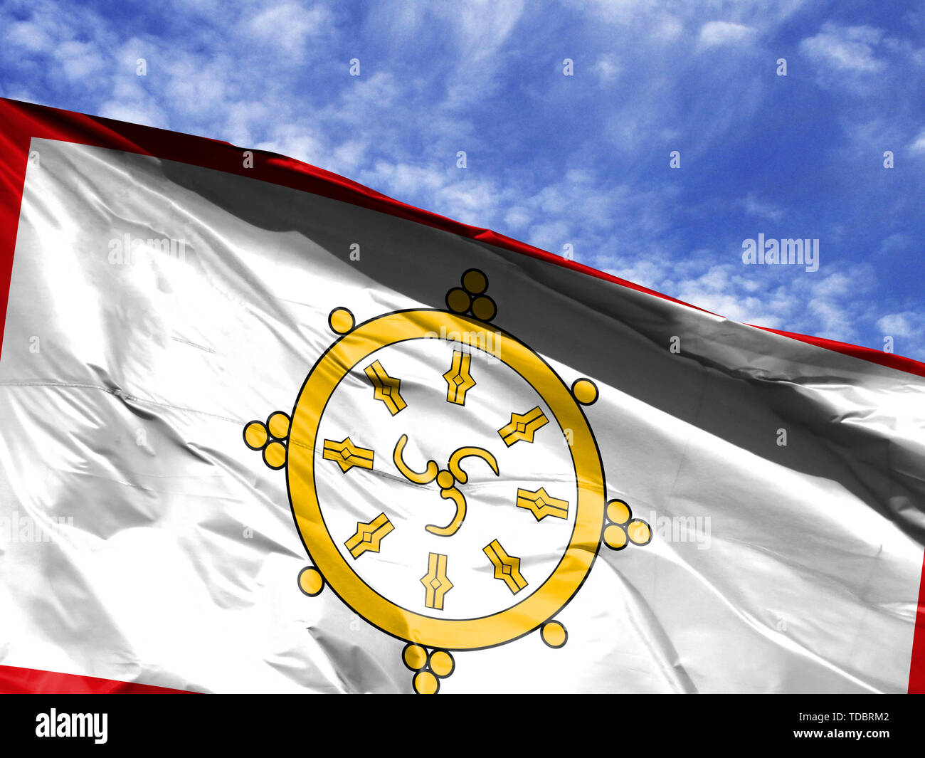 waving flag of Sikkim close up against blue sky Stock Photo - Alamy