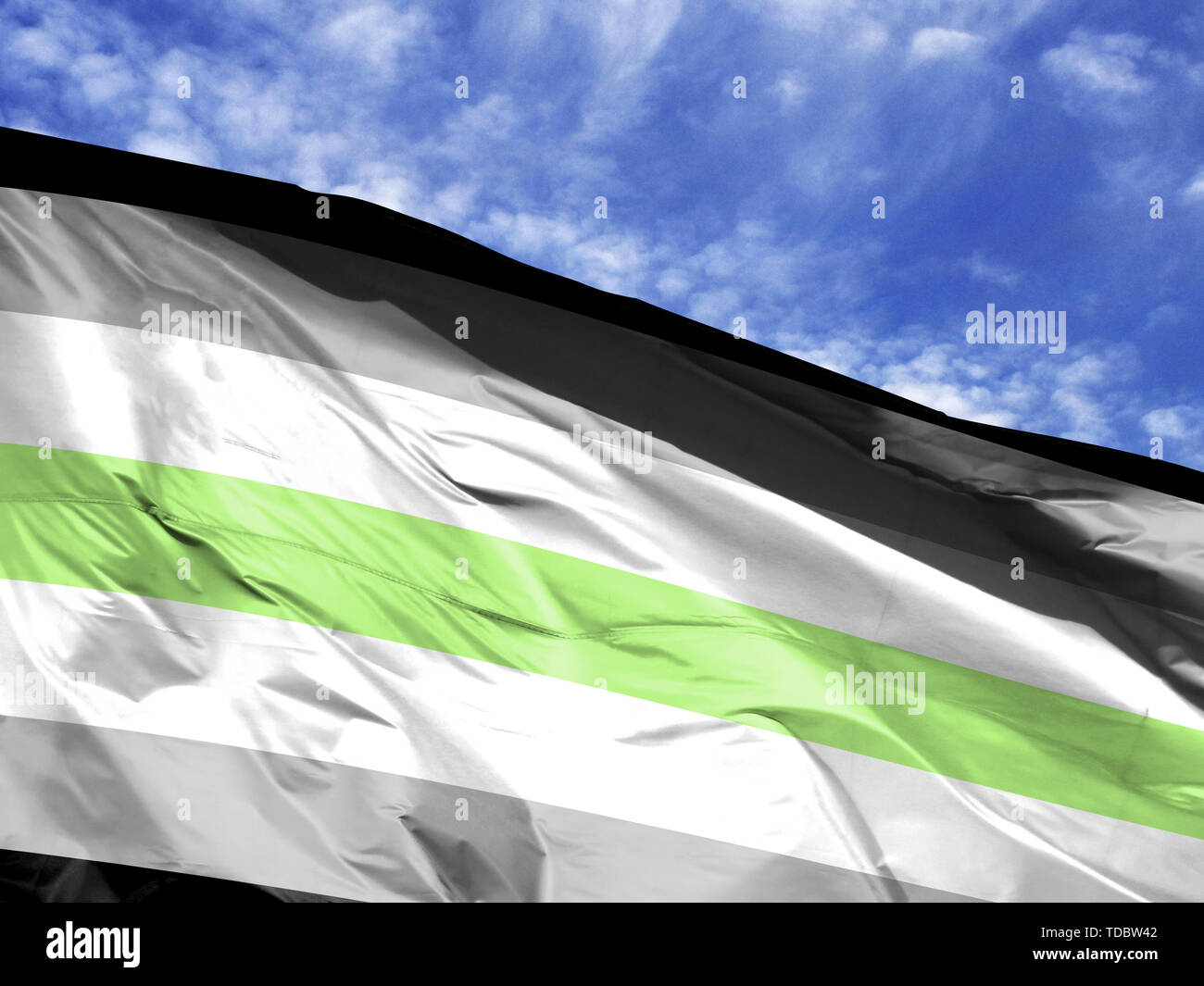 waving flag of Agender pride close up against blue sky Stock Photo - Alamy