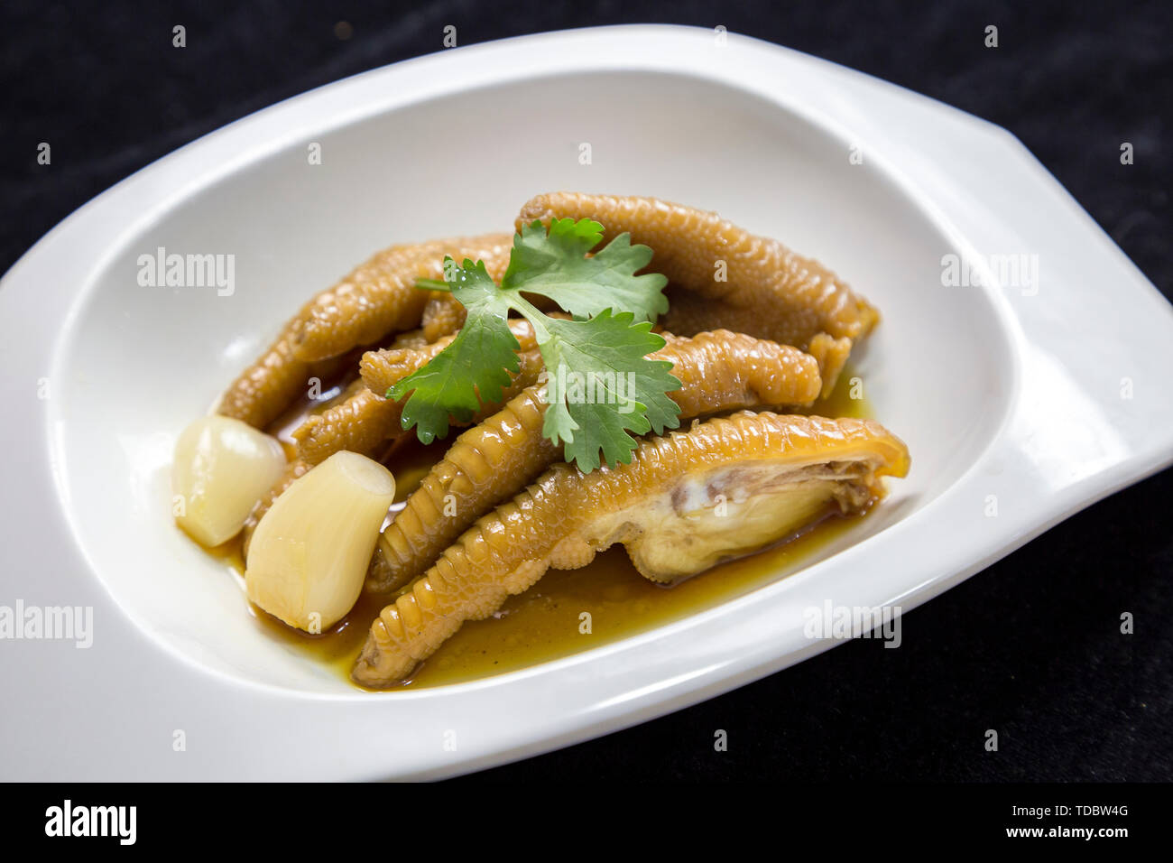 Chicken claws hi-res stock photography and images - Alamy