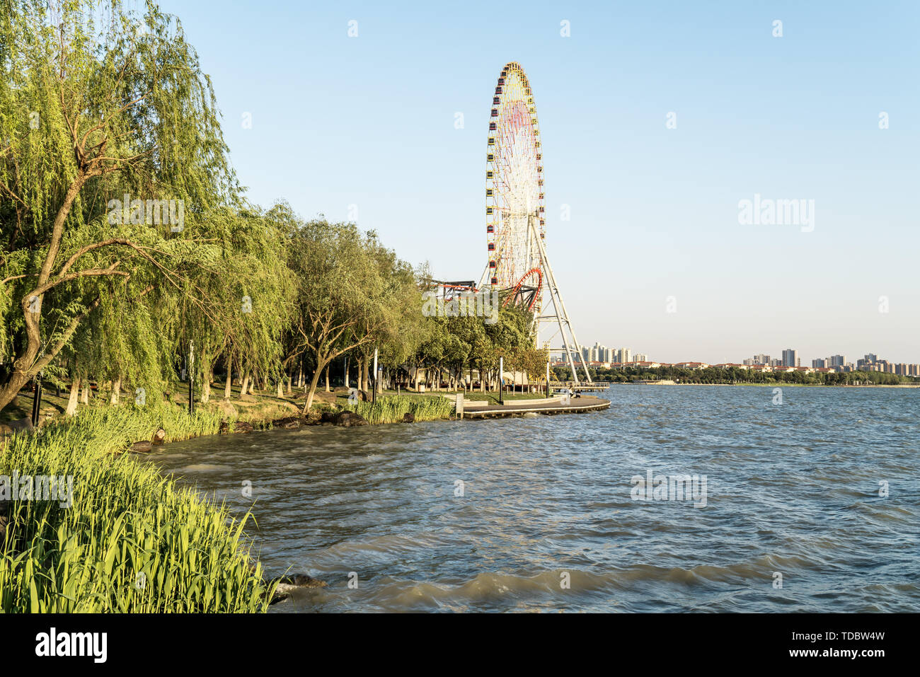 Ferris wheel and lake water Stock Photo - Alamy