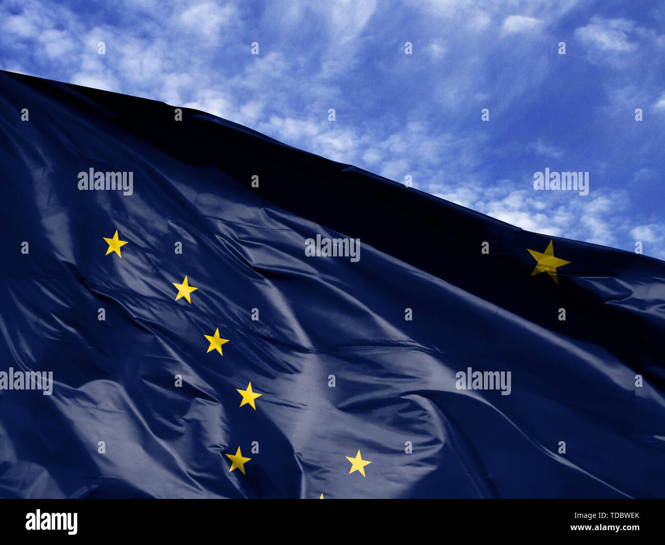 waving flag State of Alaska close up against blue sky Stock Photo - Alamy