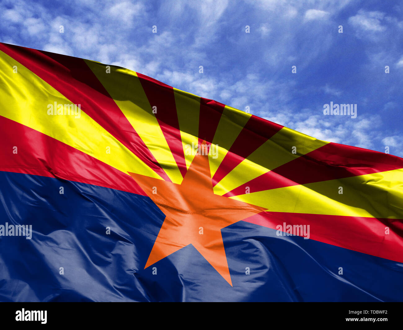 waving flag State of Arizona close up against blue sky Stock Photo - Alamy