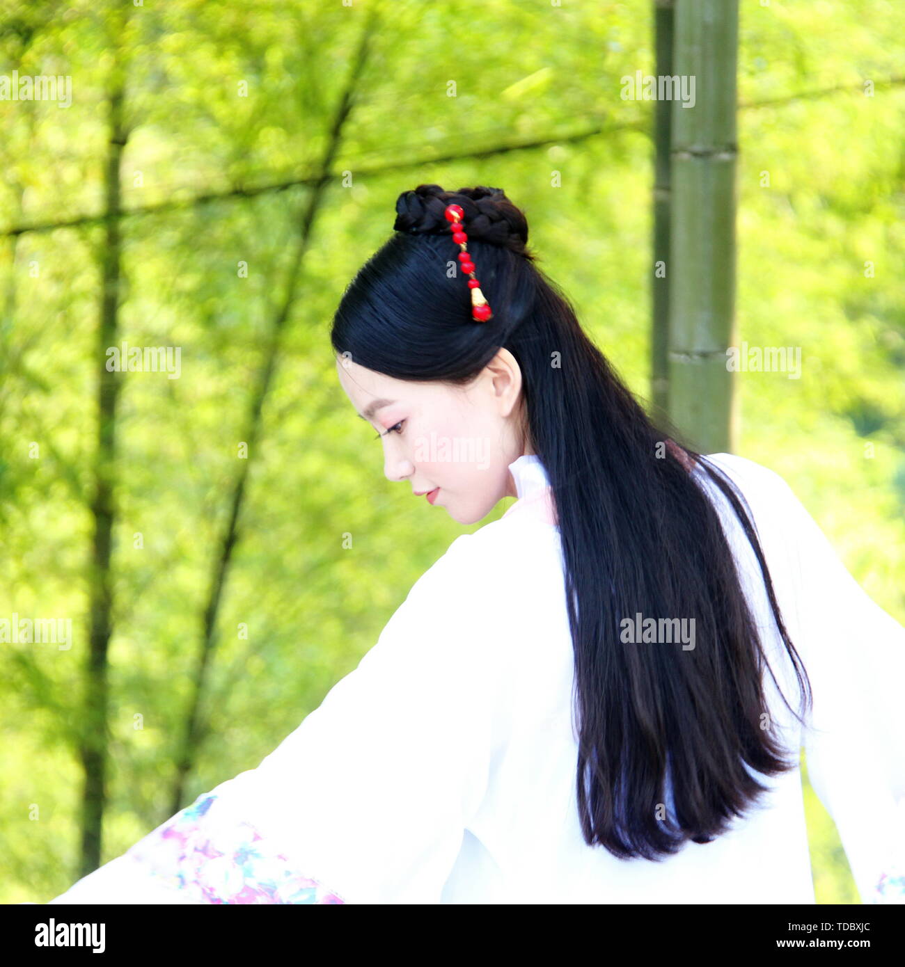 Bamboo and people Stock Photo - Alamy