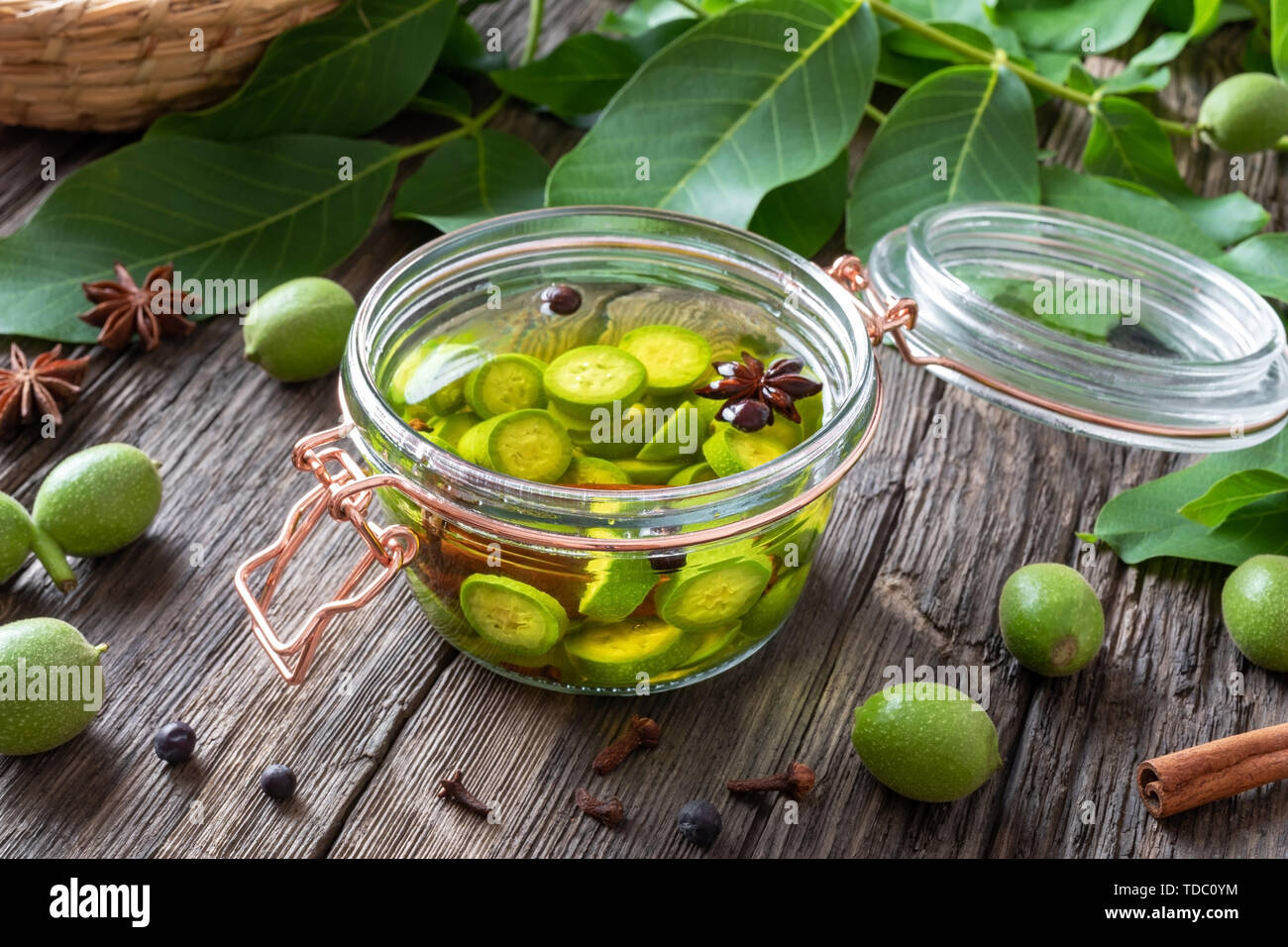 Preparation of homemade nut liqueur from unripe walnuts and spices ...