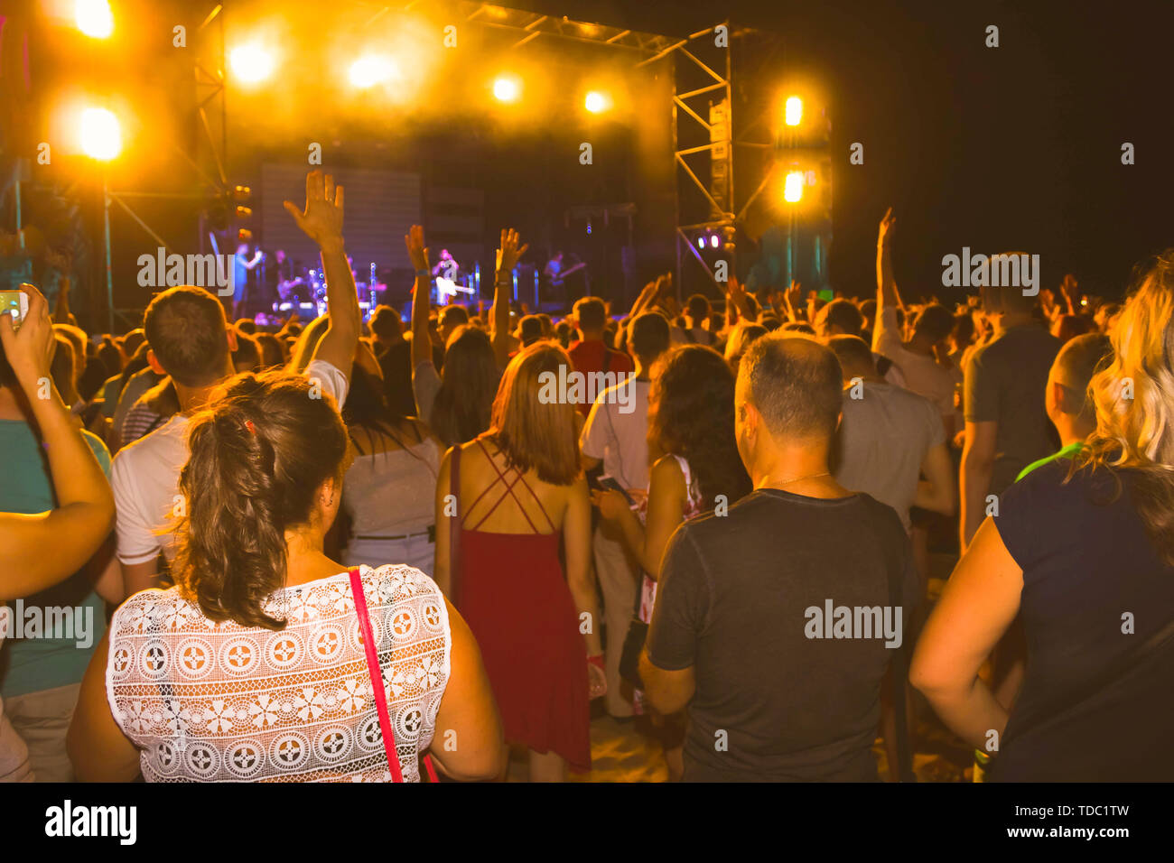 Hands up crowd bar hi-res stock photography and images - Alamy