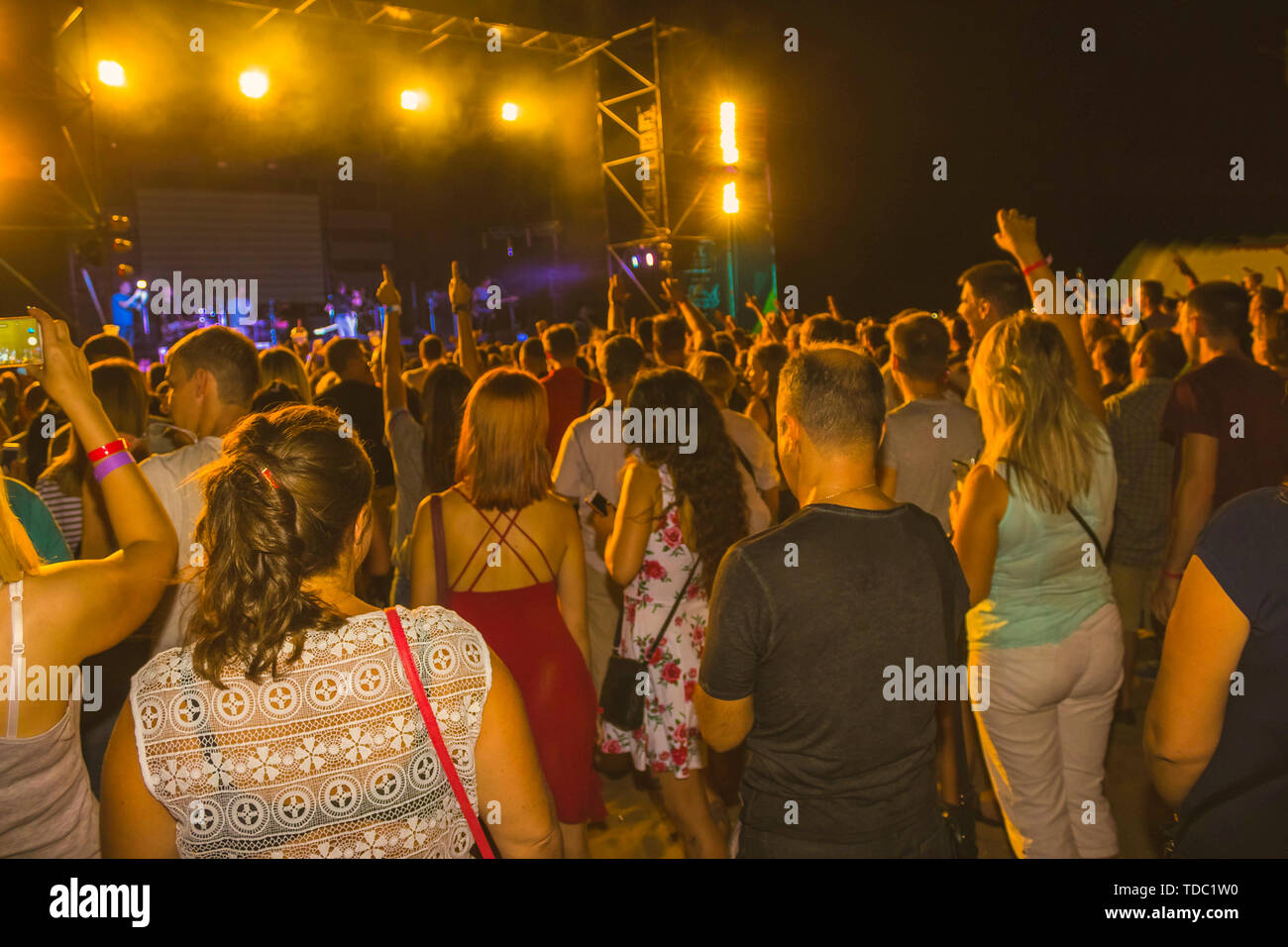 Hands up crowd bar hi-res stock photography and images - Alamy