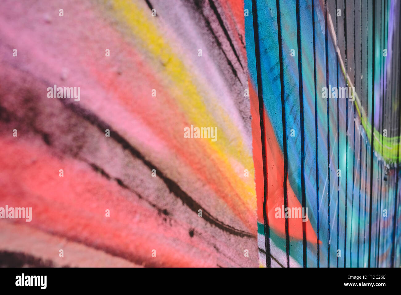 Detail of an anonymous street graffiti with many colors, cheerful urban ...