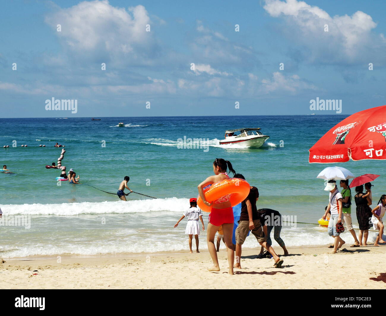 Hainan island beach surfing hi-res stock photography and images - Alamy