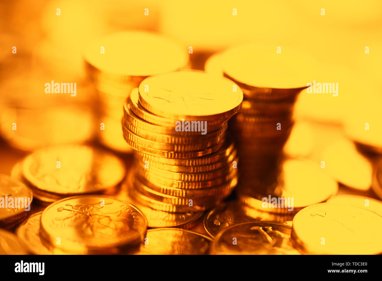 A pile of gold coins Stock Photo - Alamy