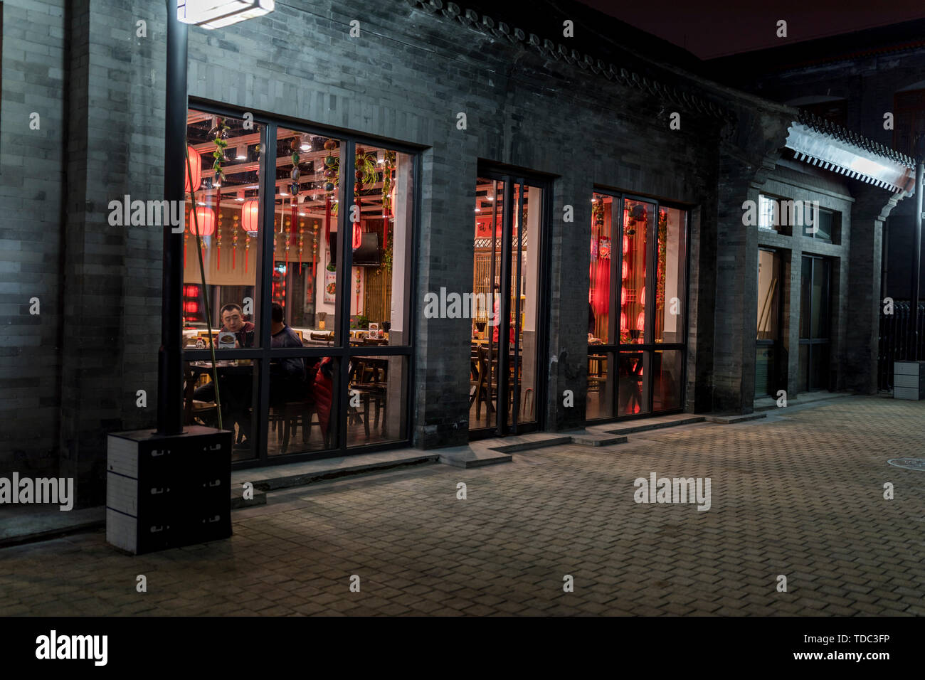 Night view of the front gate fence pedestrian street Stock Photo - Alamy