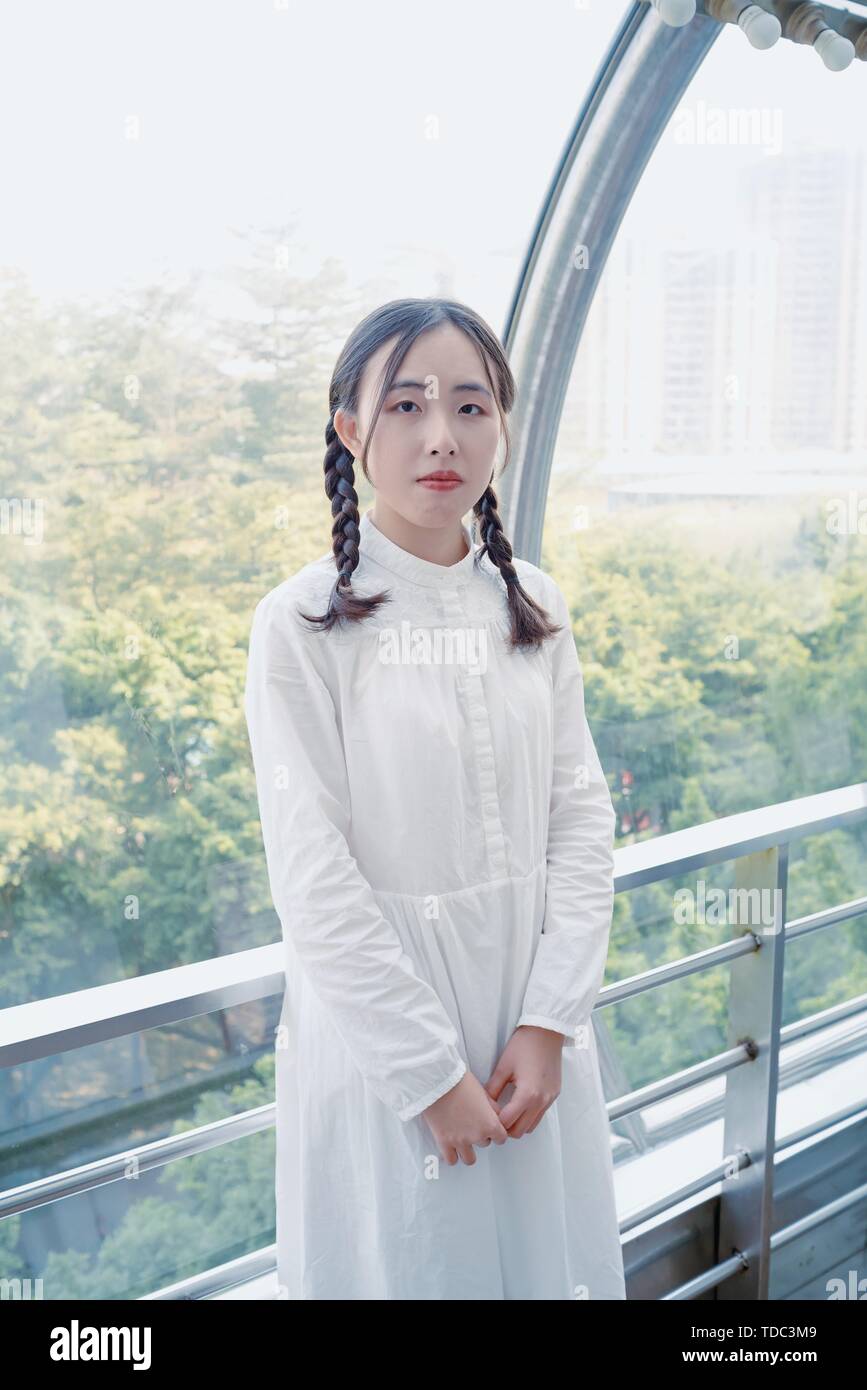 Time machine freehand girl portrait Stock Photo - Alamy