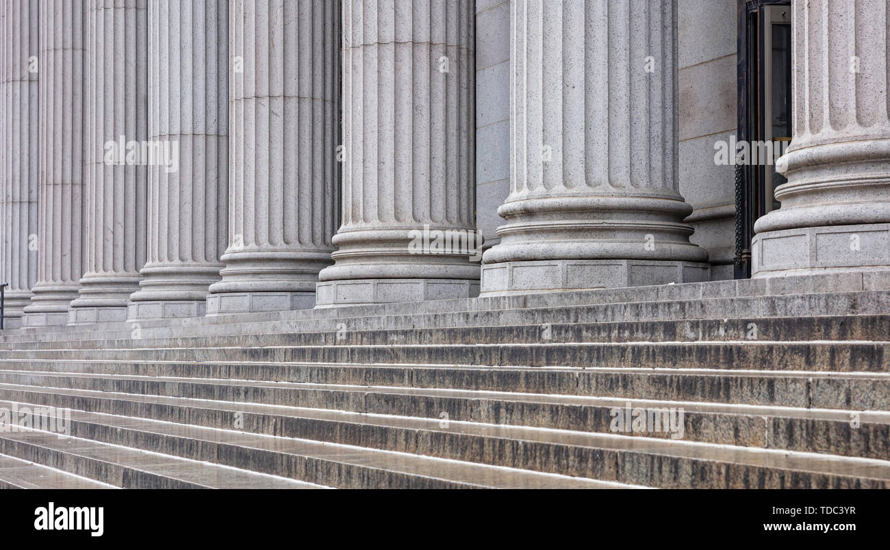 Stone colonnade and stairs detail. Classical pillars row in a building ...