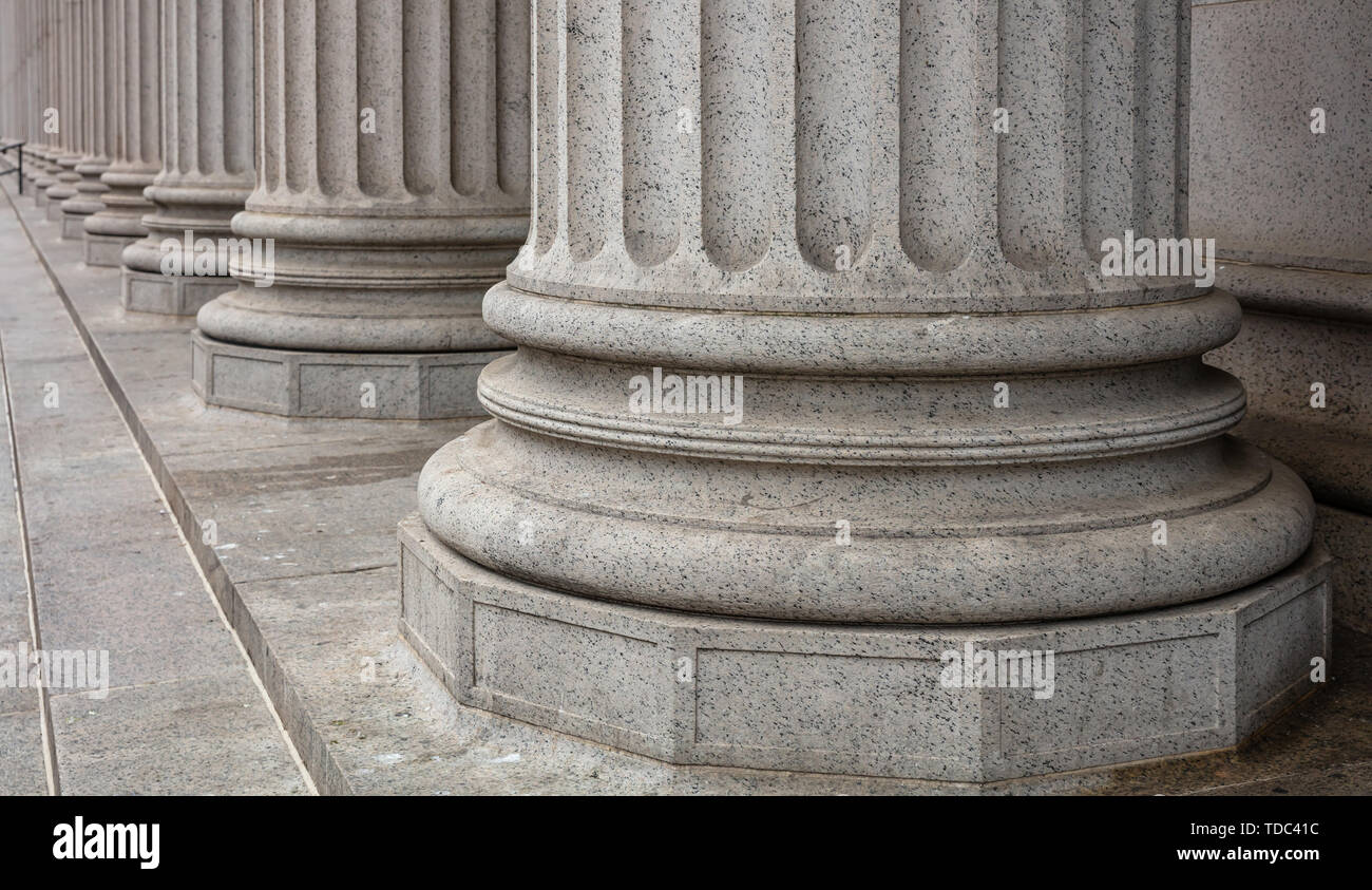 Stone colonnade and stairs detail. Classical pillars row in a building ...