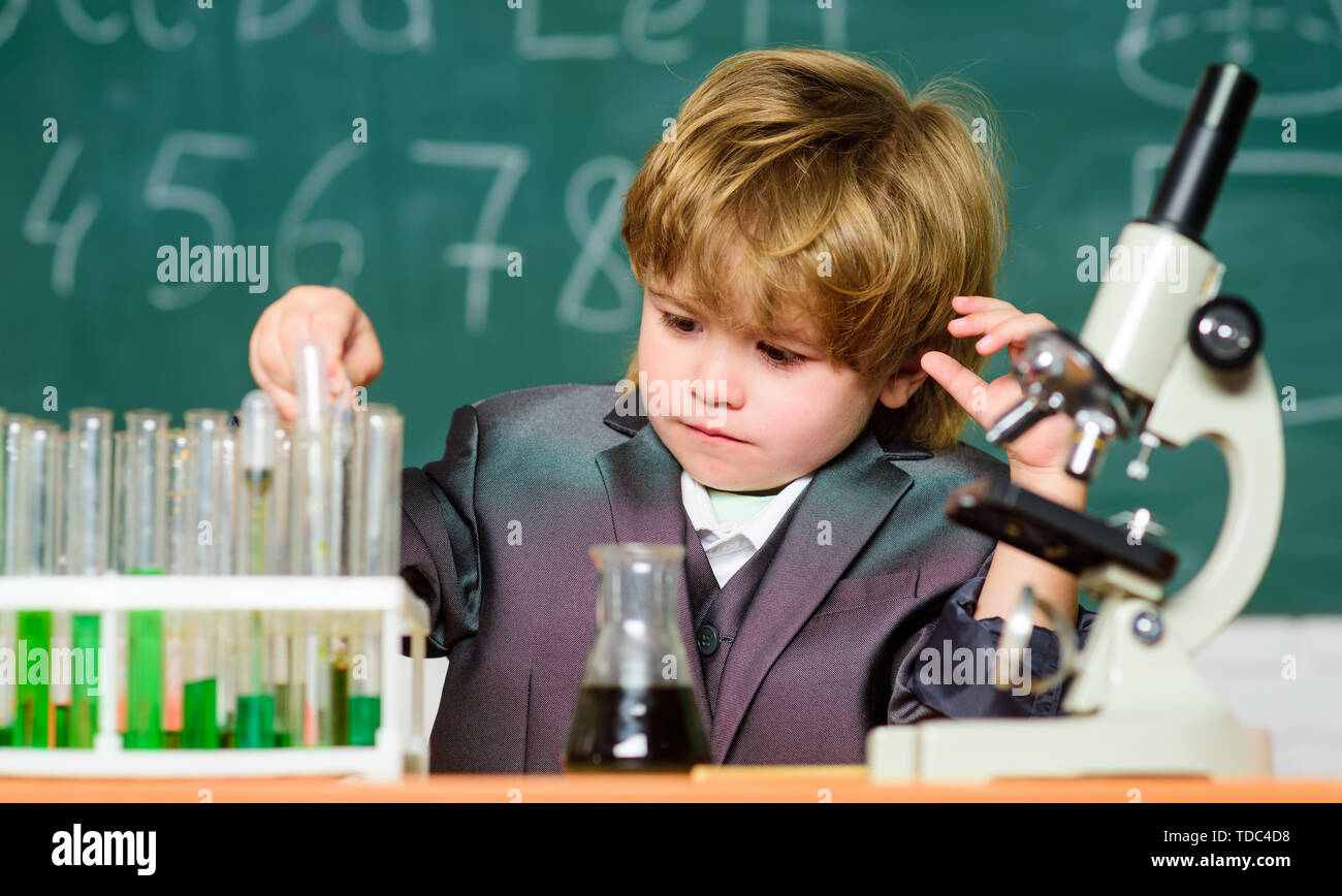 Chemical analysis. Toddler genius baby. Science concept. Gifted child ...