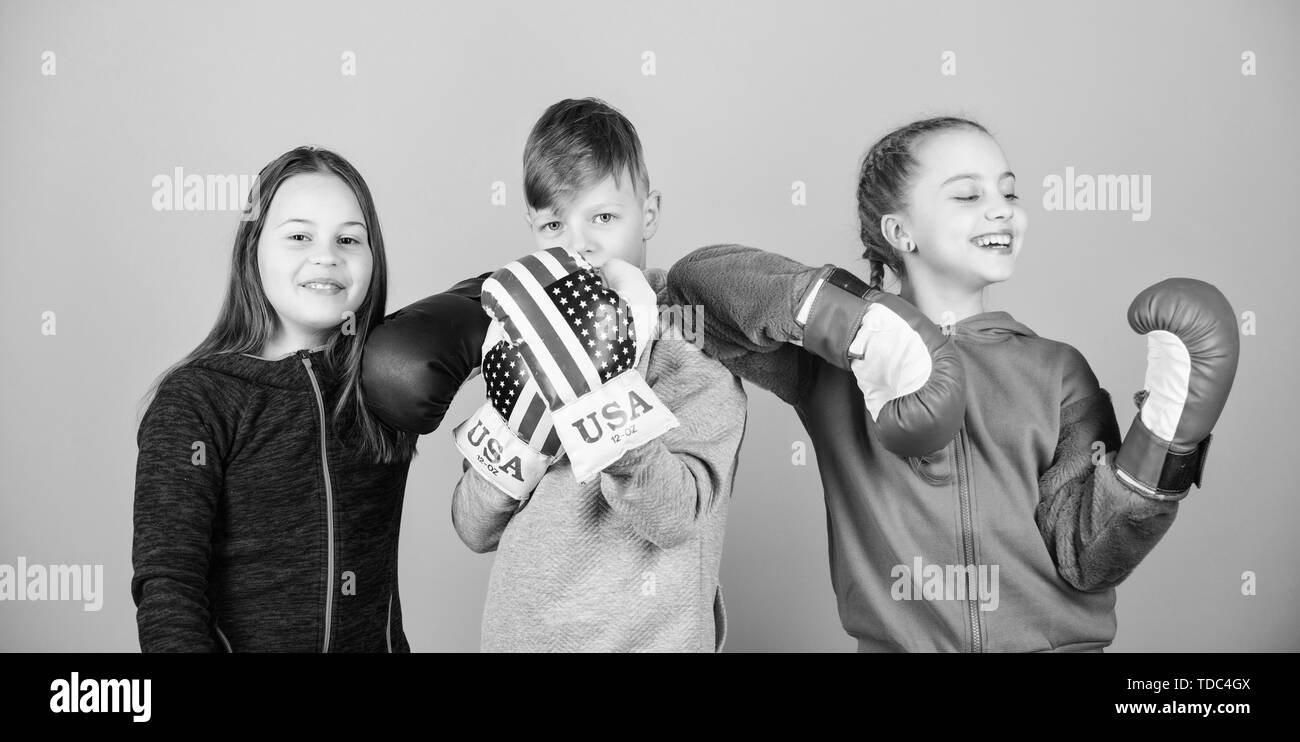 Happy children in boxing gloves. Fitness diet. energy health. punching ...