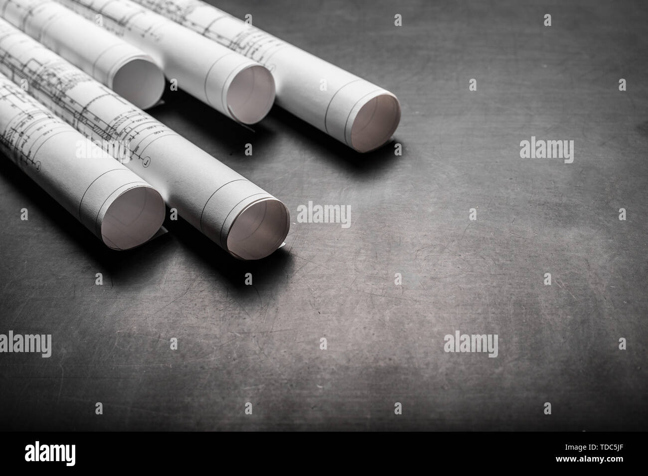 Construction planning drawings on black background Stock Photo - Alamy