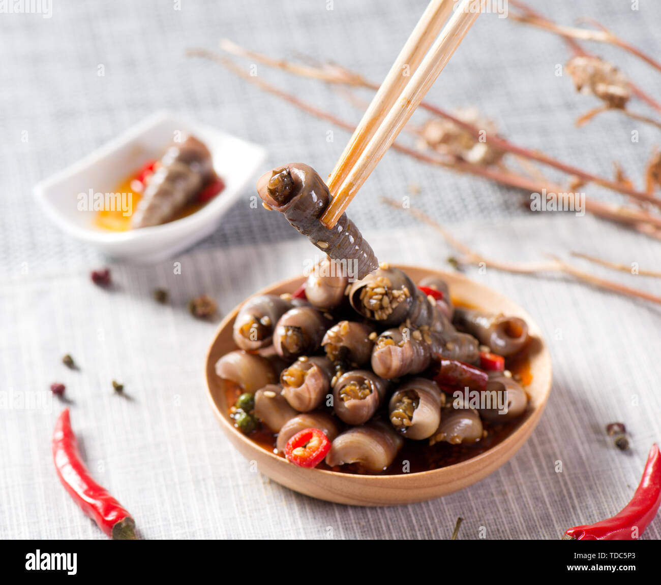 Spicy seafood snail Stock Photo - Alamy