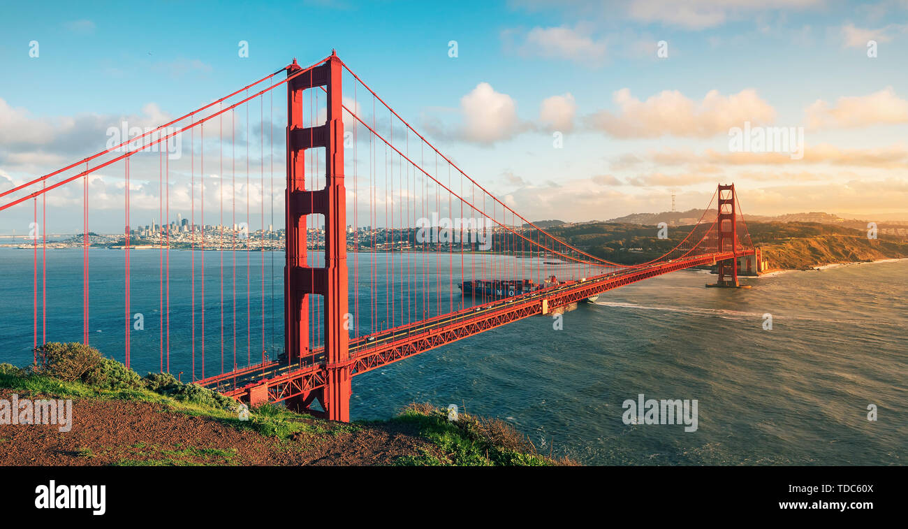 The Golden Gate Bridge, standing above the Golden Gate Strait in San ...