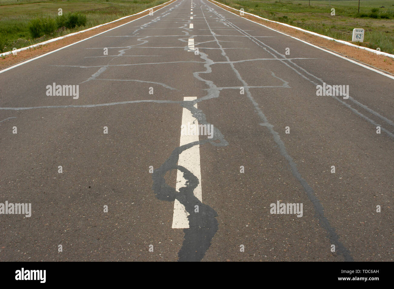 The asphalt road under your feet Stock Photo - Alamy