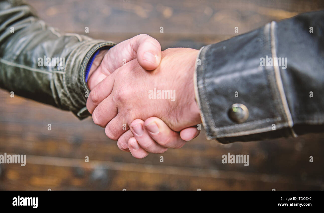 Handshake friendly gesture. Handshake gesture concept. Partnership and ...