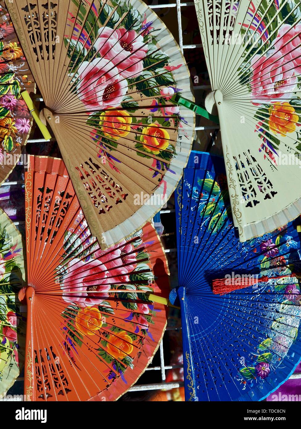Colorful chinese fans at a market Stock Photo - Alamy
