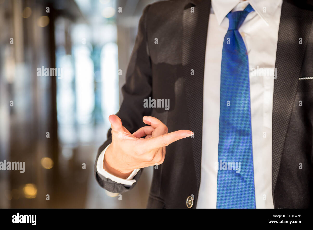 Business man gestures Stock Photo - Alamy