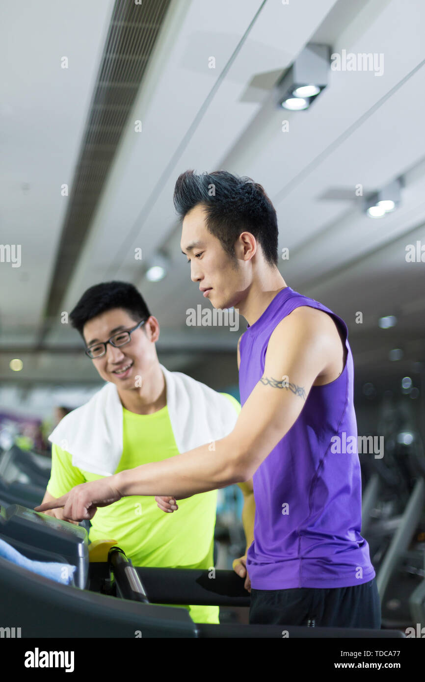 young asian people working out in modern gym Stock Photo - Alamy