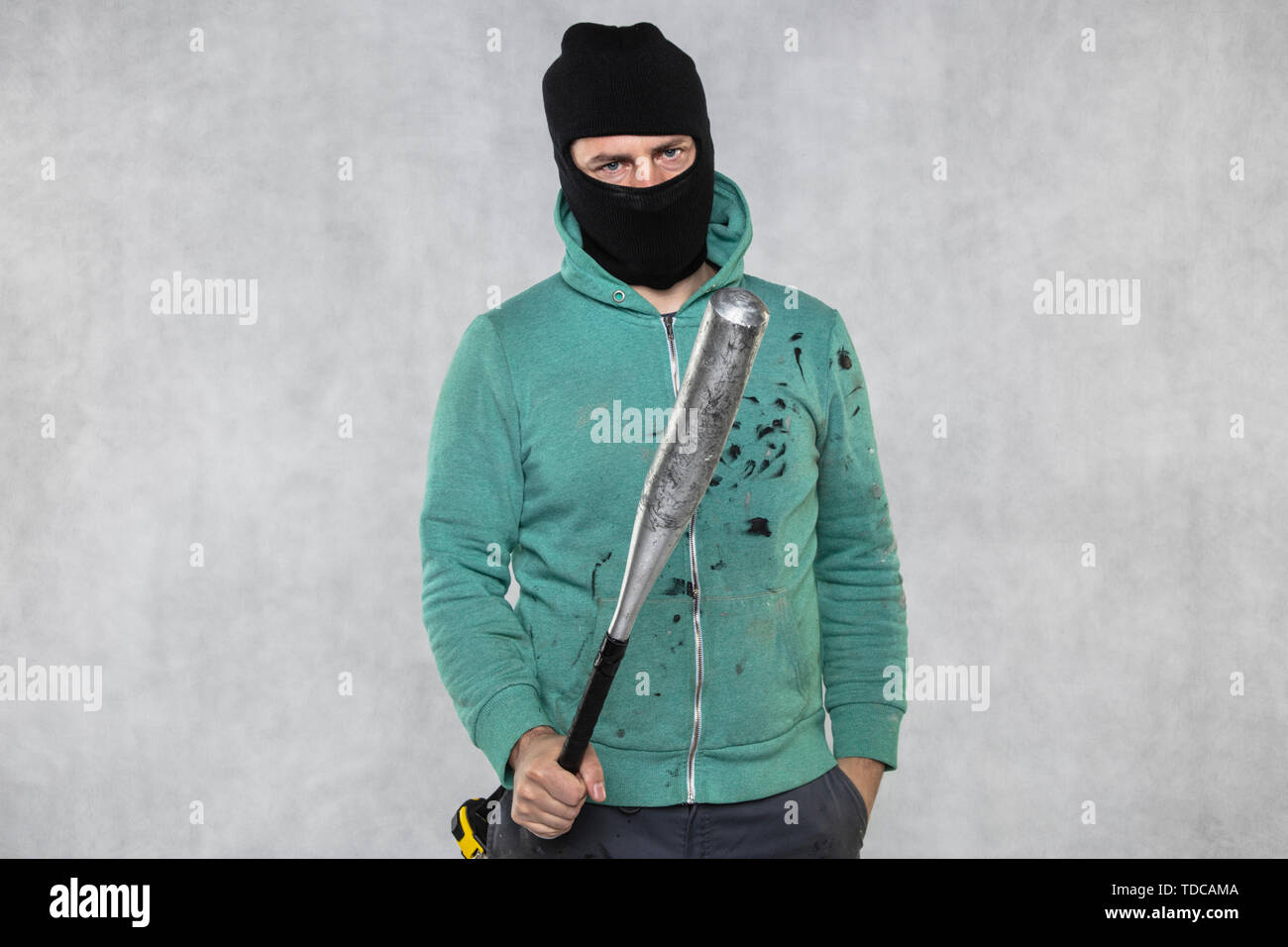 Balaclava man baseball bat hi-res stock photography and images - Alamy