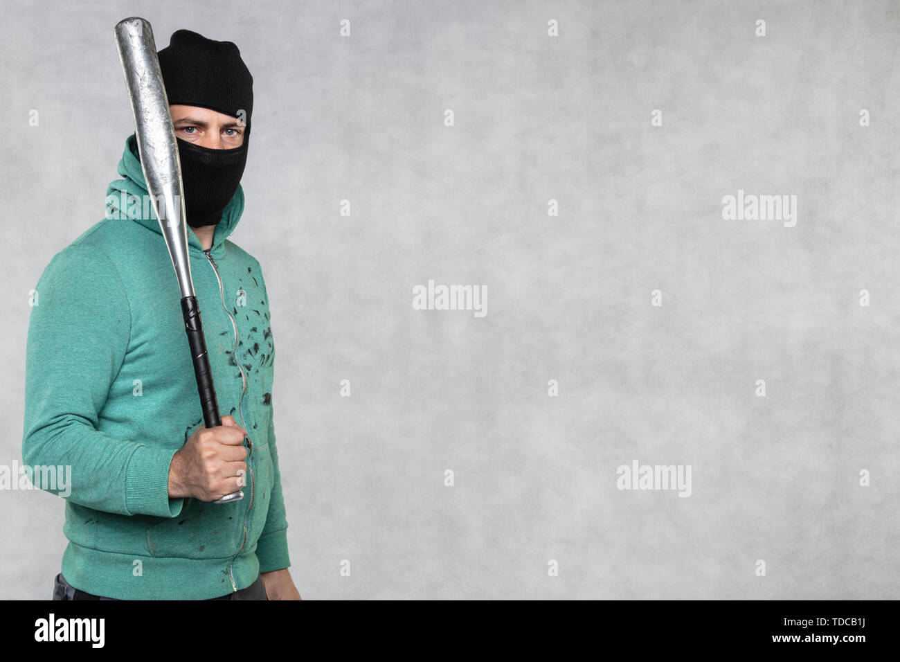 Balaclava man baseball bat hi-res stock photography and images - Alamy